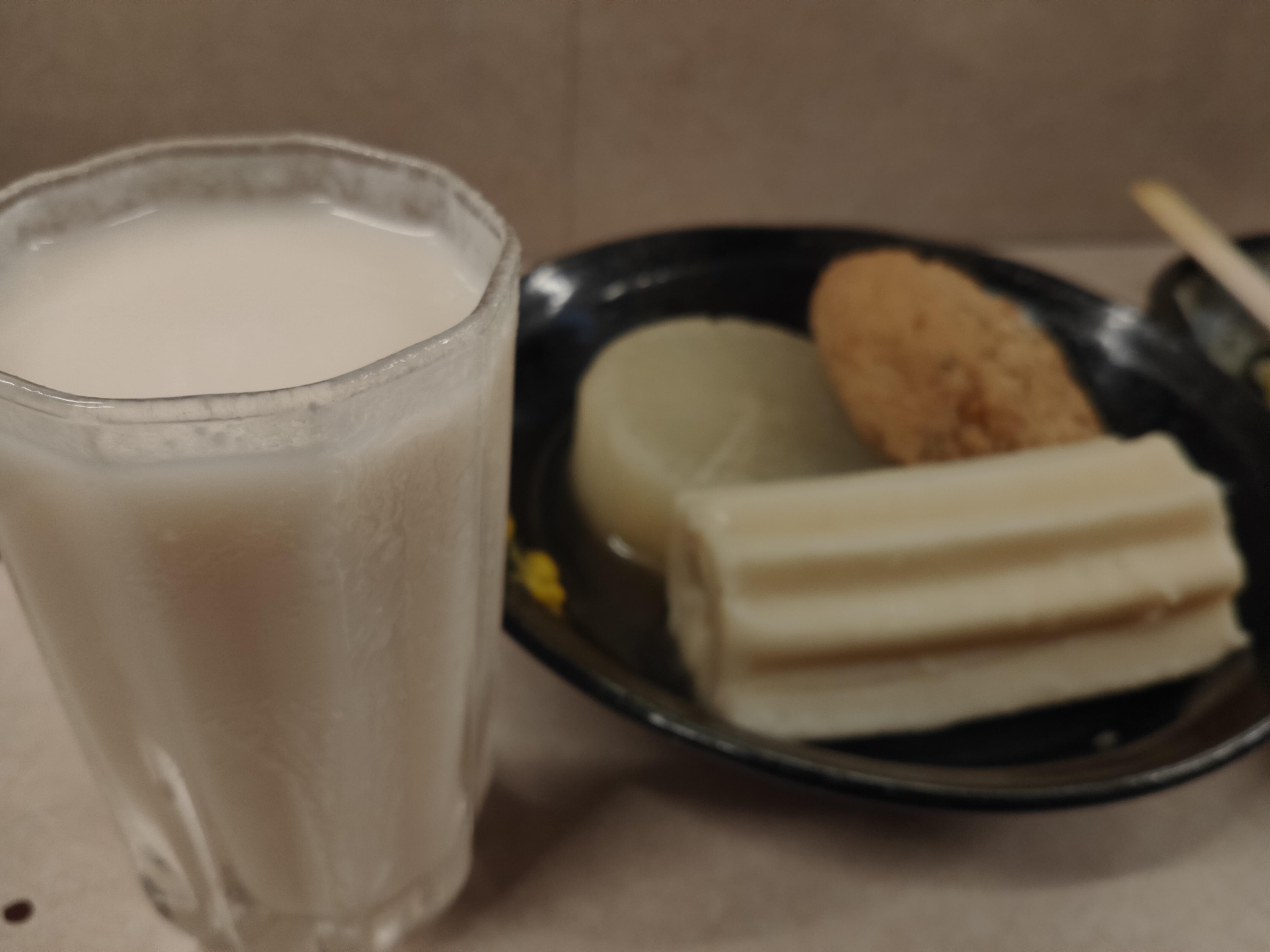 Oden and nigori sake (Japanese sake). Daikon radish, chikuwabu, and ...