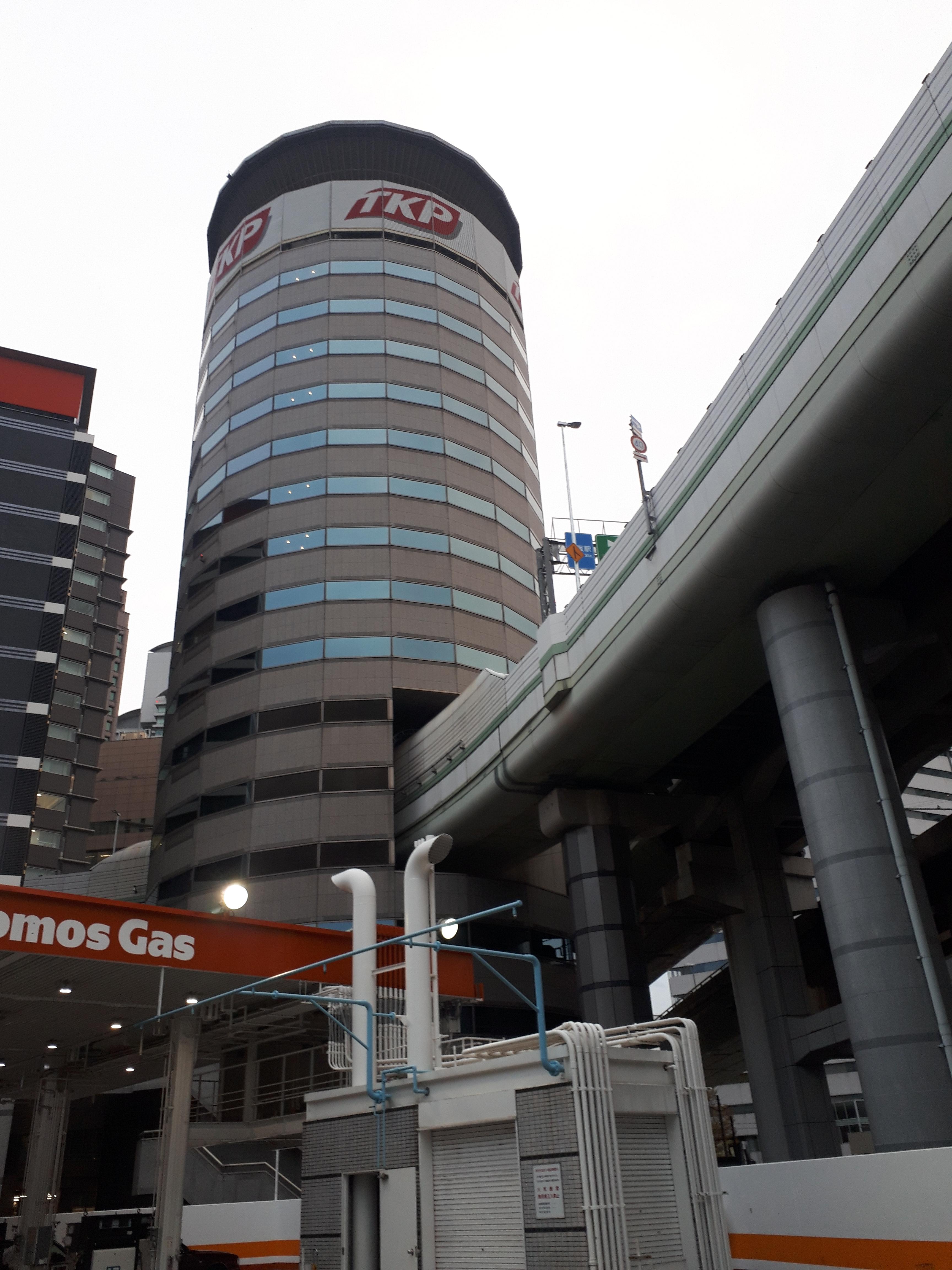 Trainline going through a building in Osaka - Lonely Japan