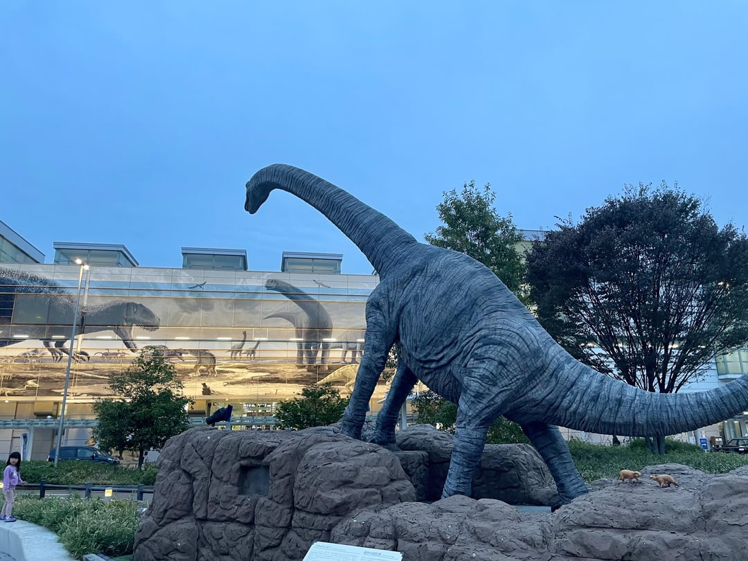 Animatronic dinosaurs in front of JR Fukui Station. - Lonely Japan